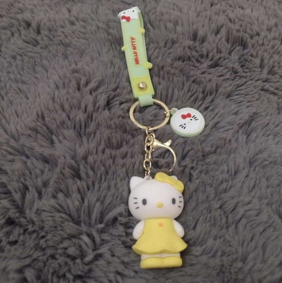 Hello Kitty | Accessories | Hello Kitty Yellow Dress Keychain | Poshmark